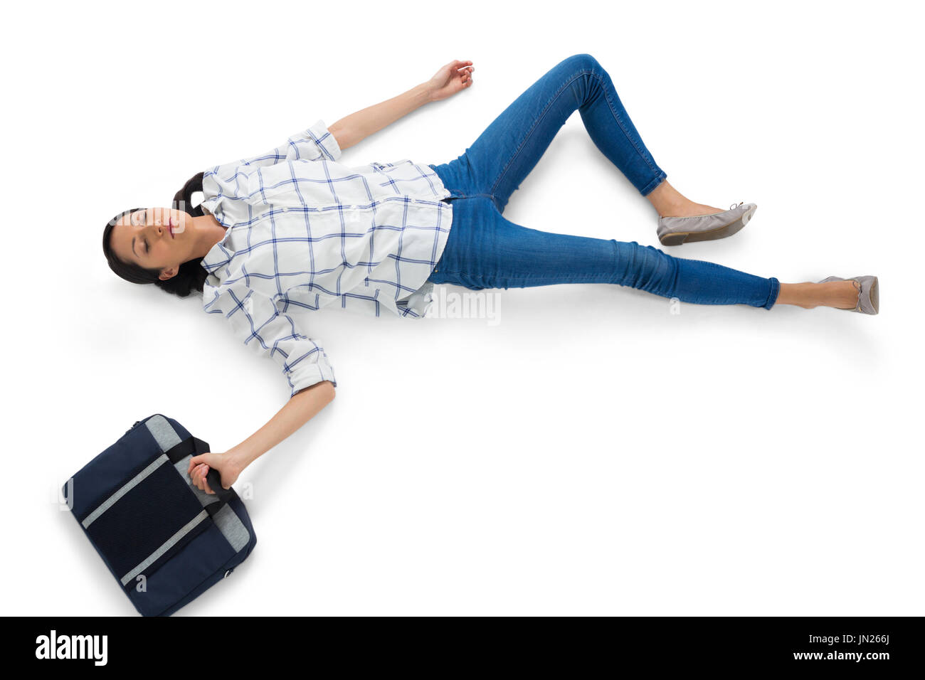Unconscious woman lying on white background Stock Photo - Alamy