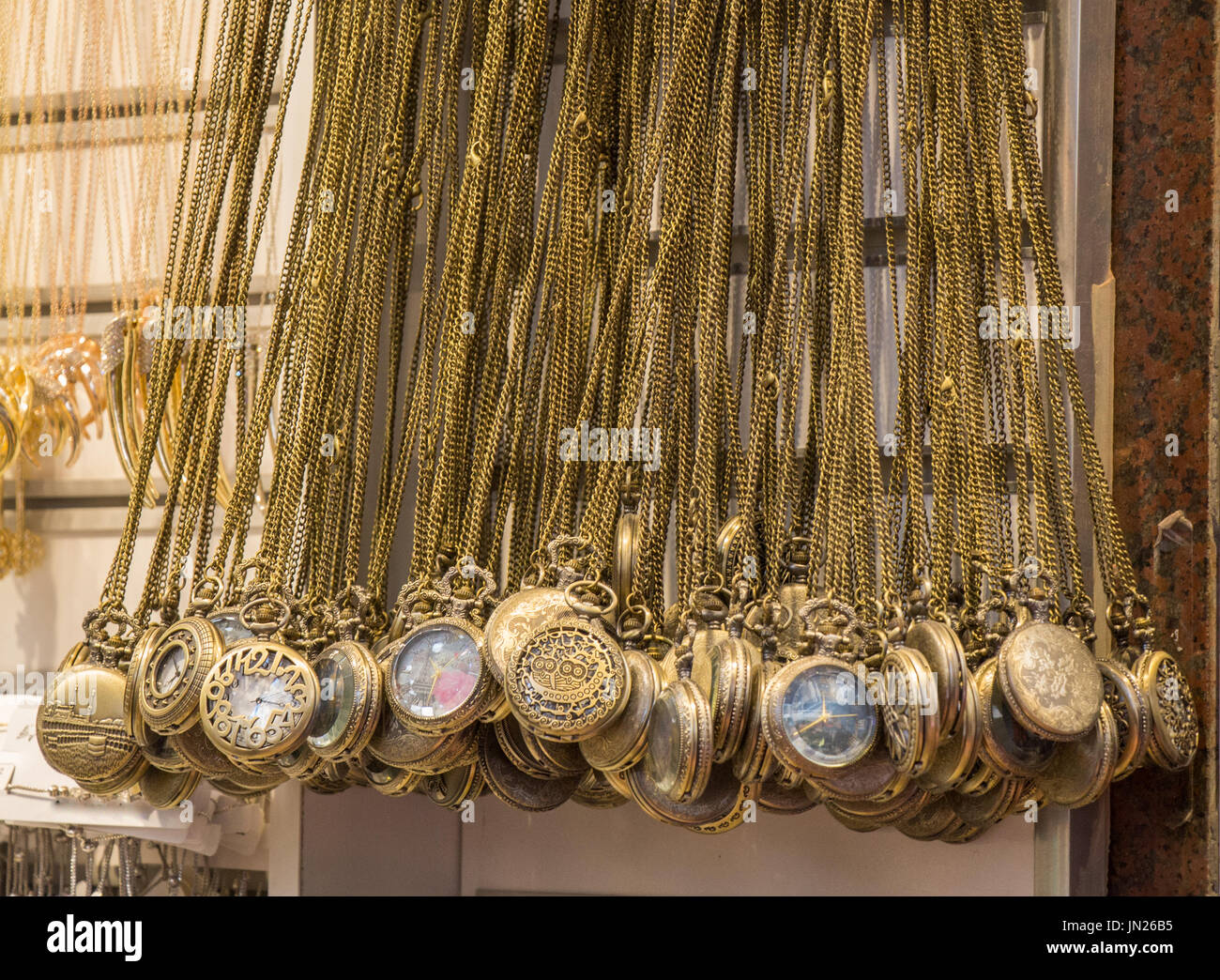 Set of retro styled pocket watches hanging Stock Photo - Alamy