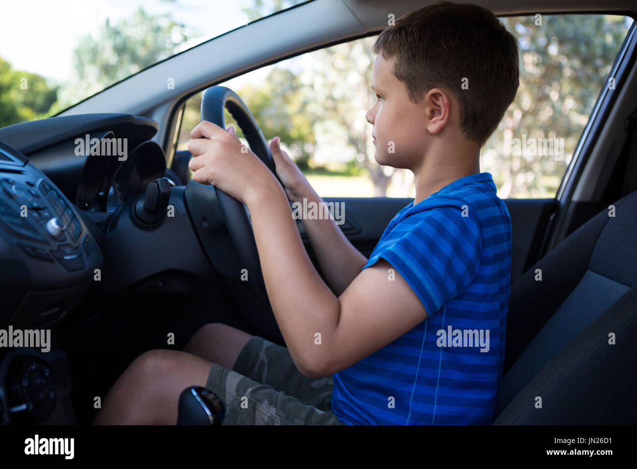 Boy Driving Stock Photos & Boy Driving Stock Images - Alamy