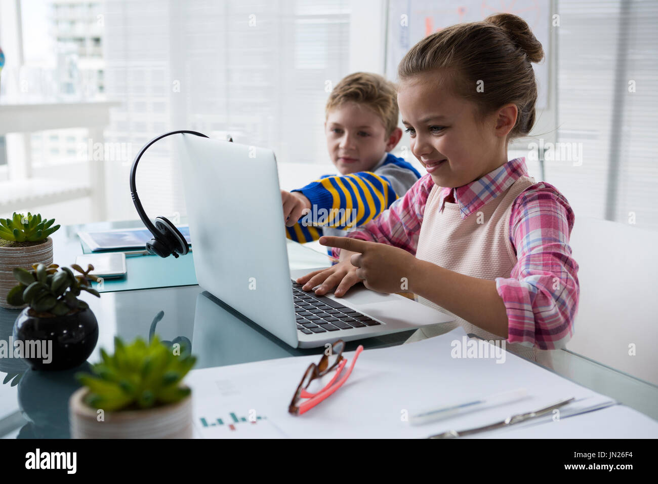 Boy Girl Office Desk Talking High Resolution Stock Photography and ...