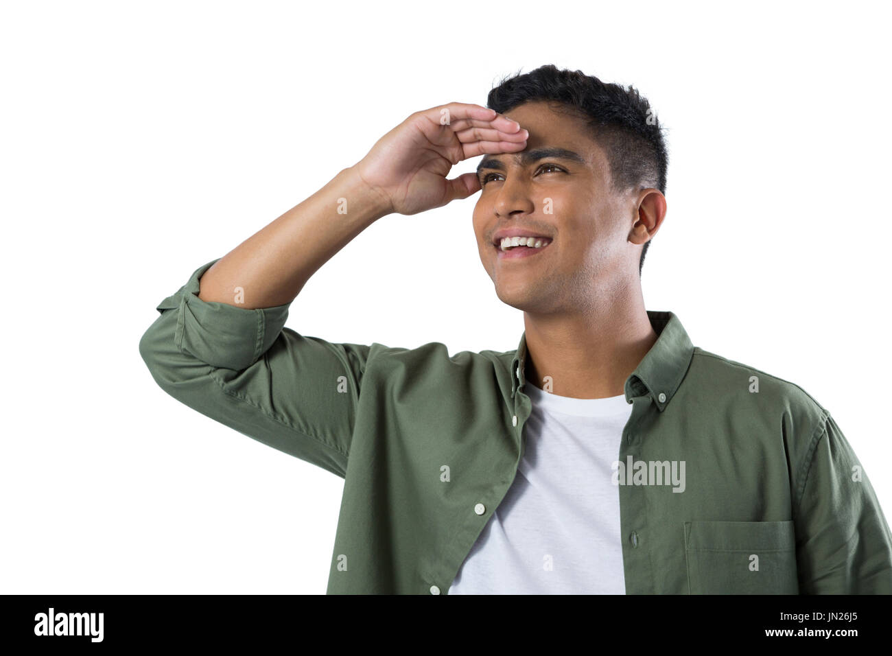 Handsome man shielding eyes against white background Stock Photo - Alamy
