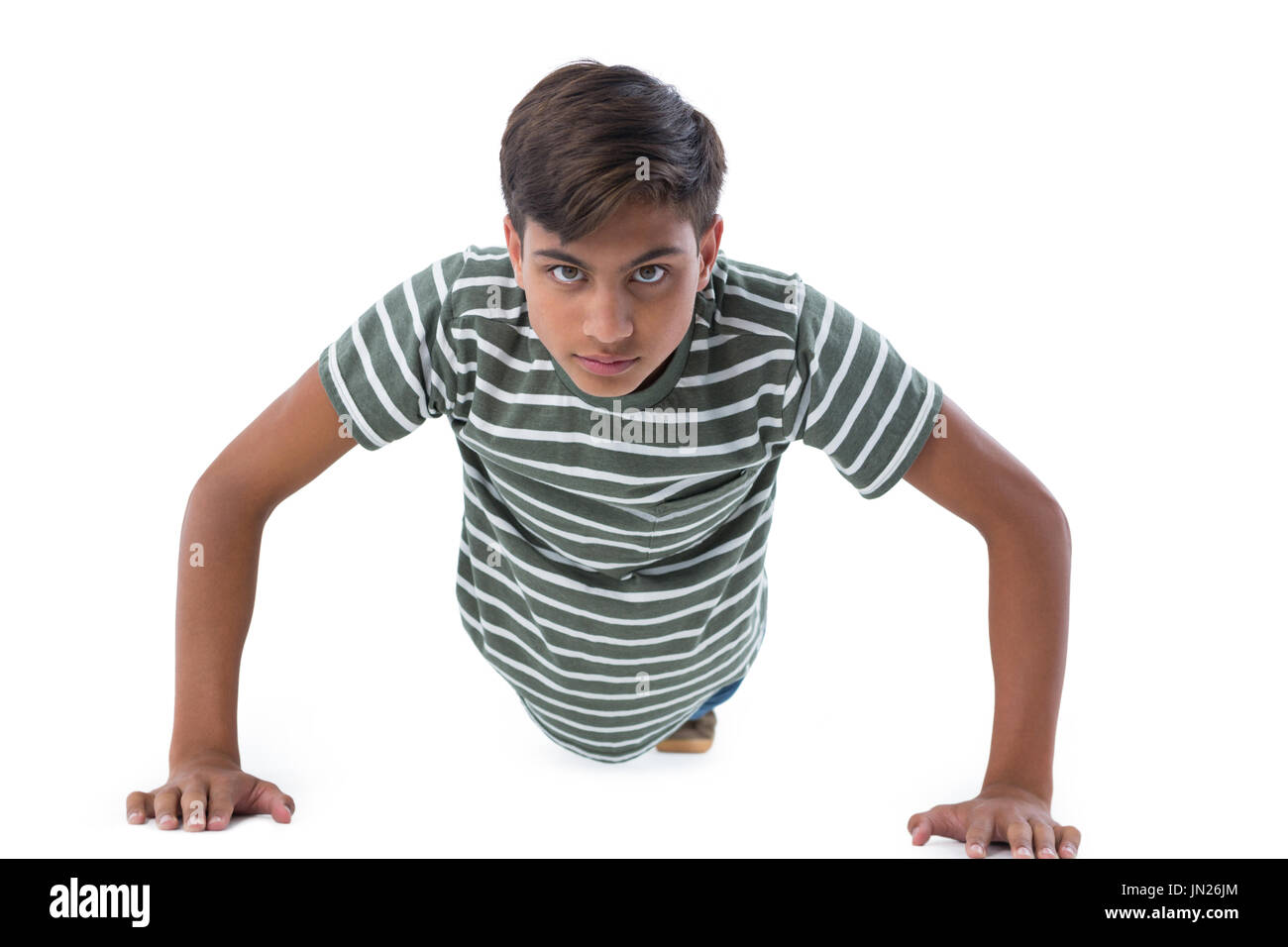 Confident teenage boy performing push ups Stock Photo - Alamy