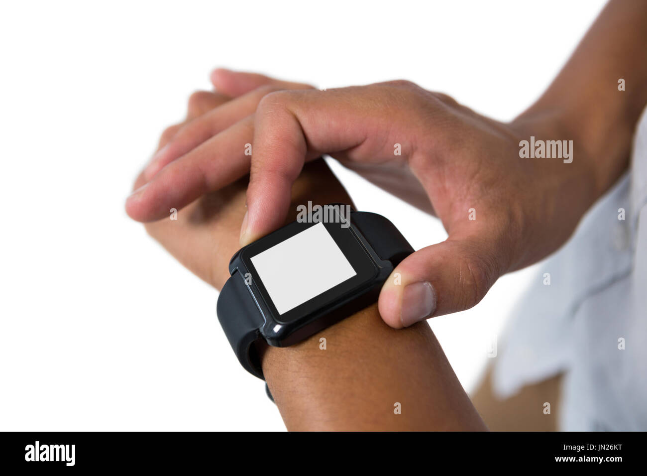 Mid section of man using smartwatch against white background Stock ...