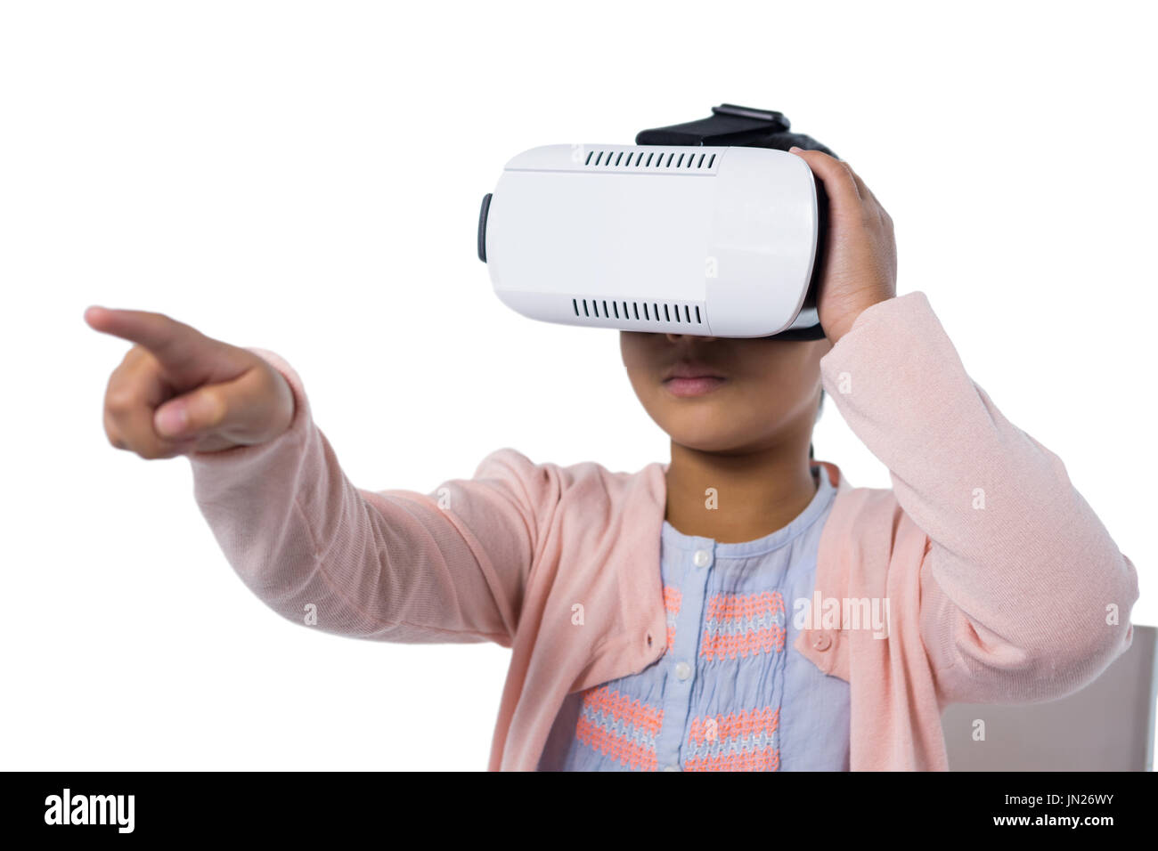 Girl using virtual reality headset against white background Stock Photo ...