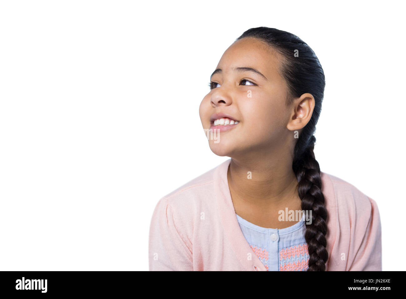 Smiling girl against white background Stock Photo - Alamy