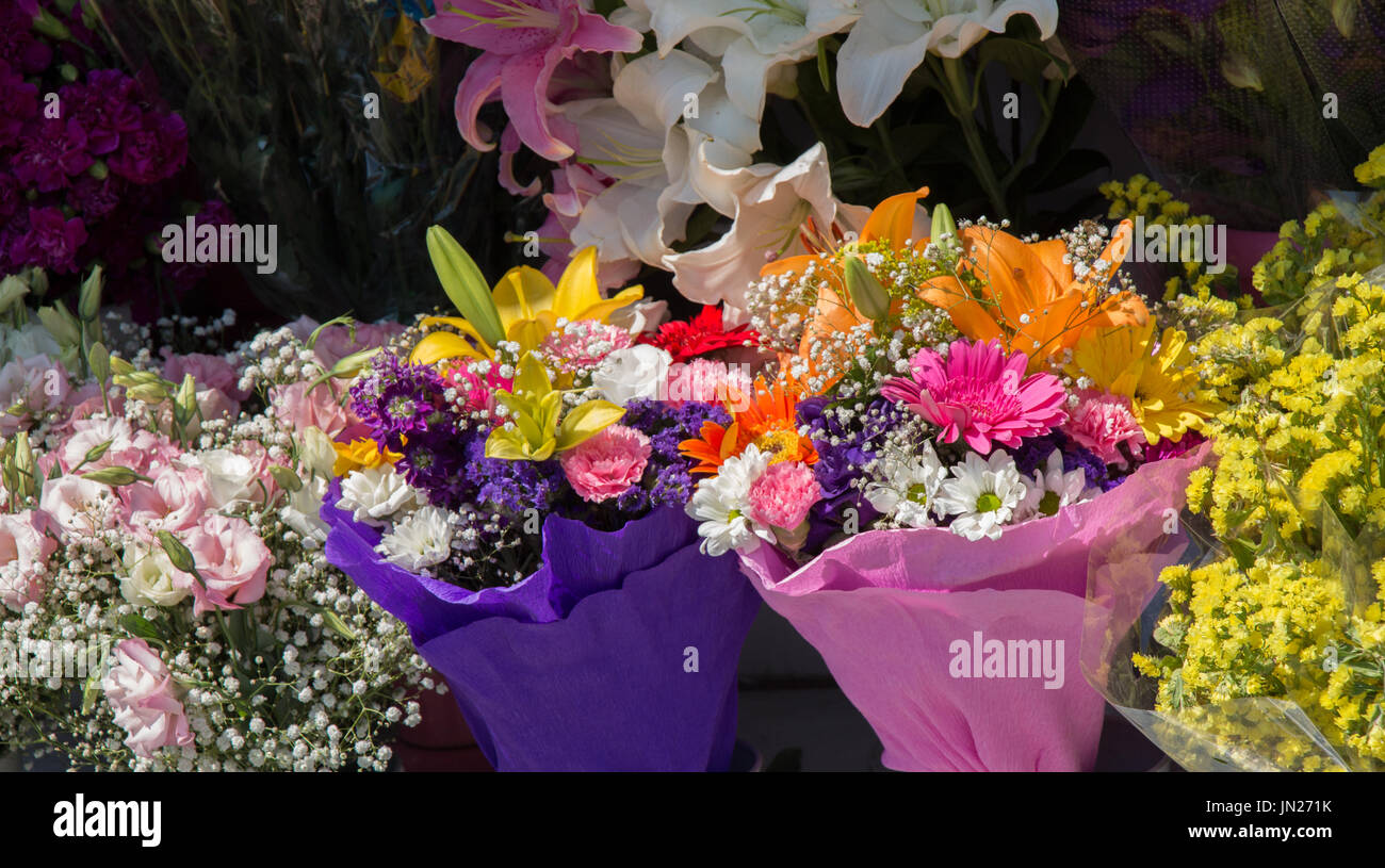 Beautiful flowers of various types in a flower in vase Stock Photo - Alamy