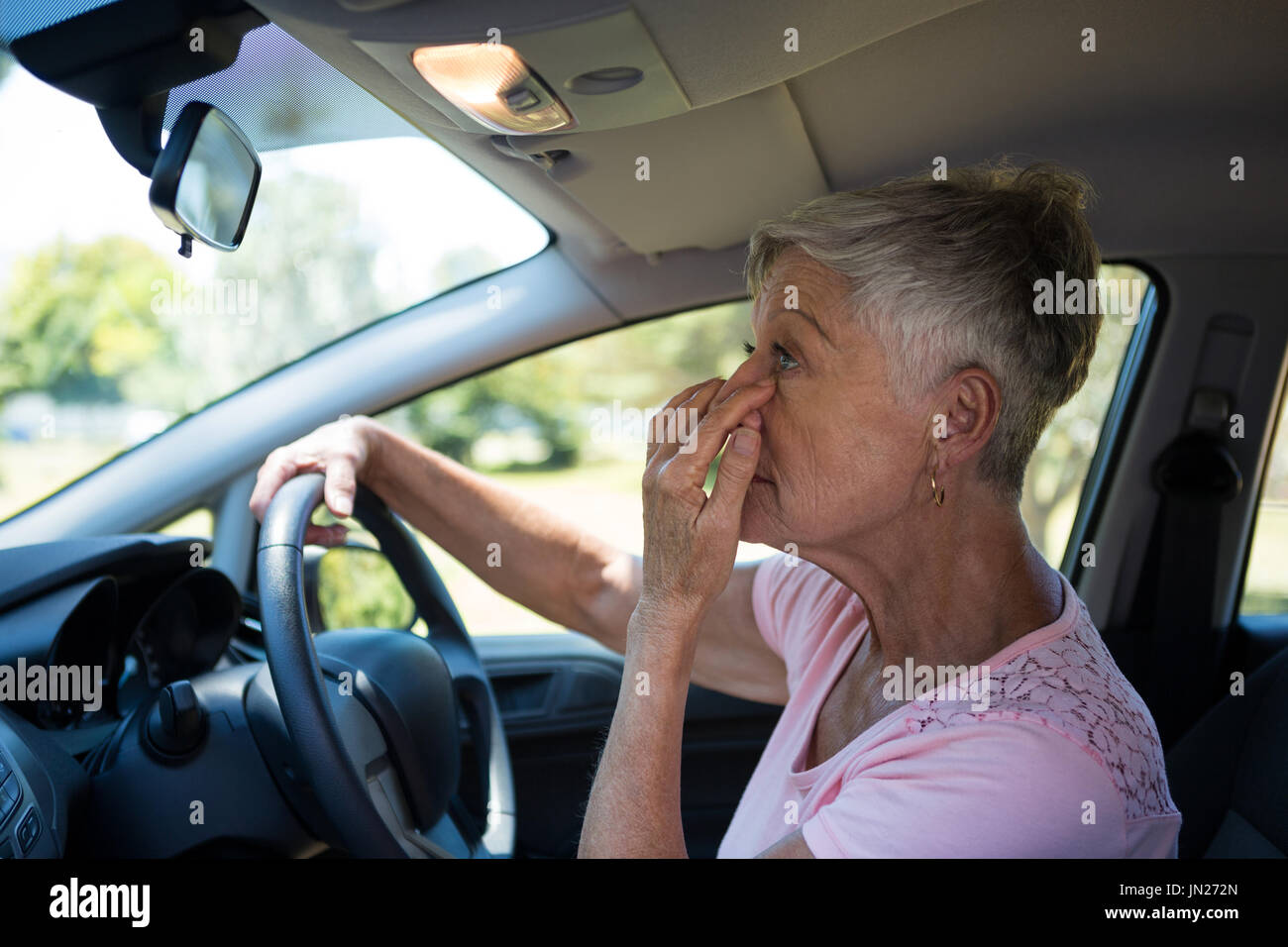 Adjusting the rear view mirror hi-res stock photography and images - Alamy