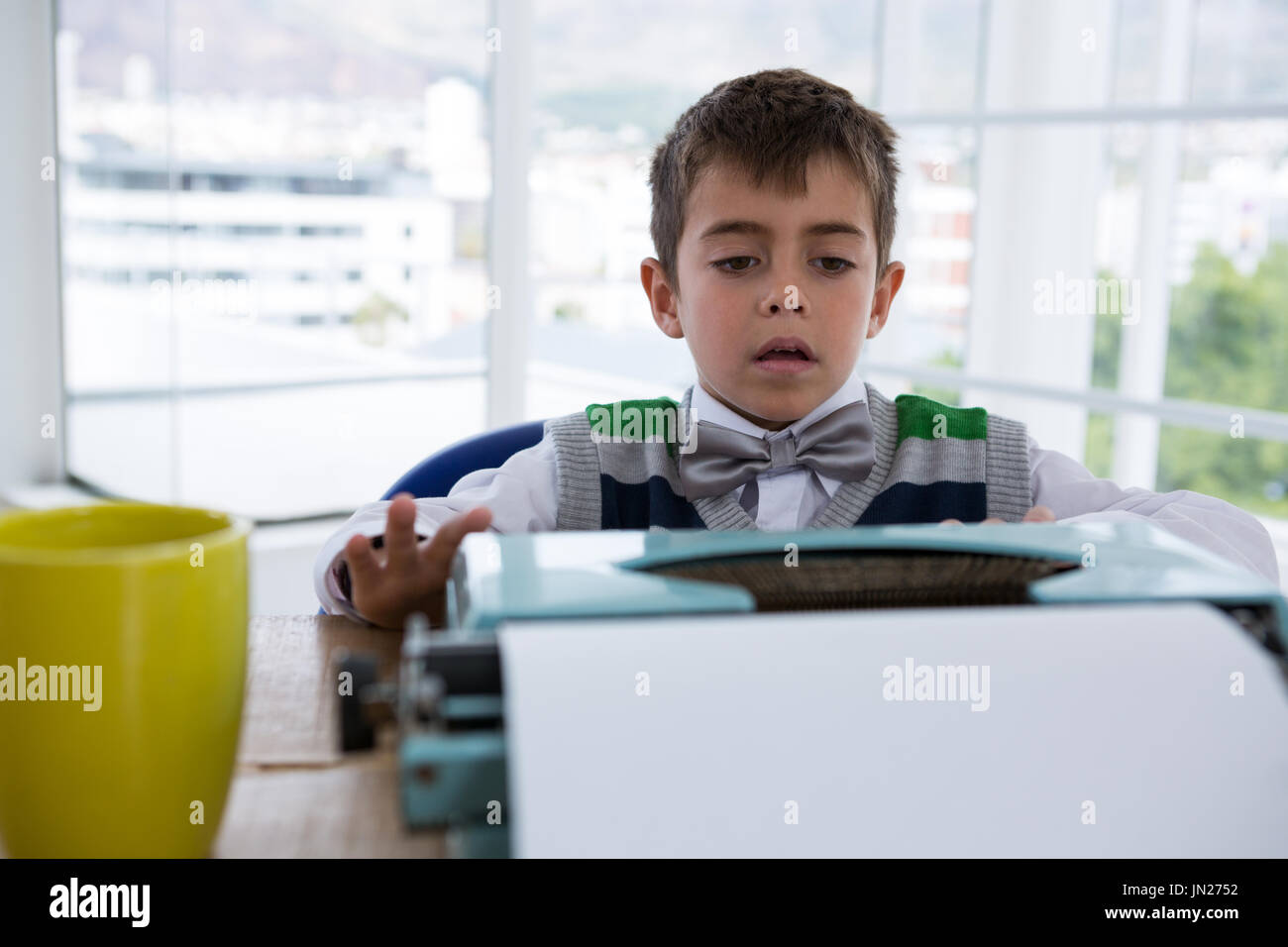 Boy typewriter typing hi-res stock photography and images - Alamy