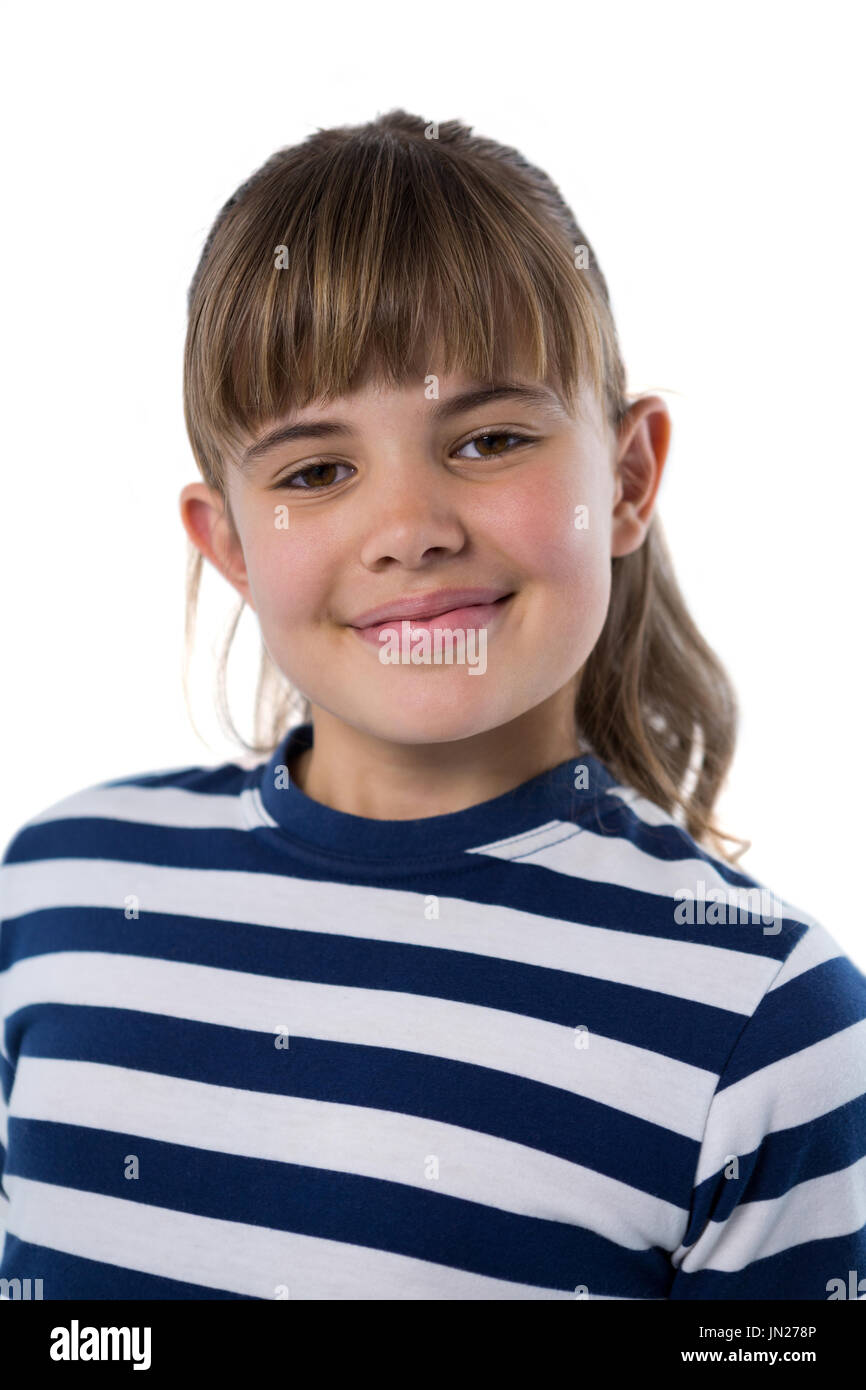 Portrait of cute girl against white background Stock Photo - Alamy