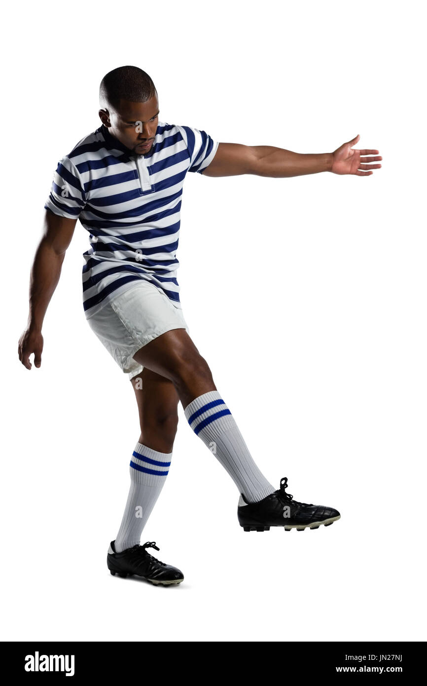 Full length of male rugby player playing against white background Stock ...