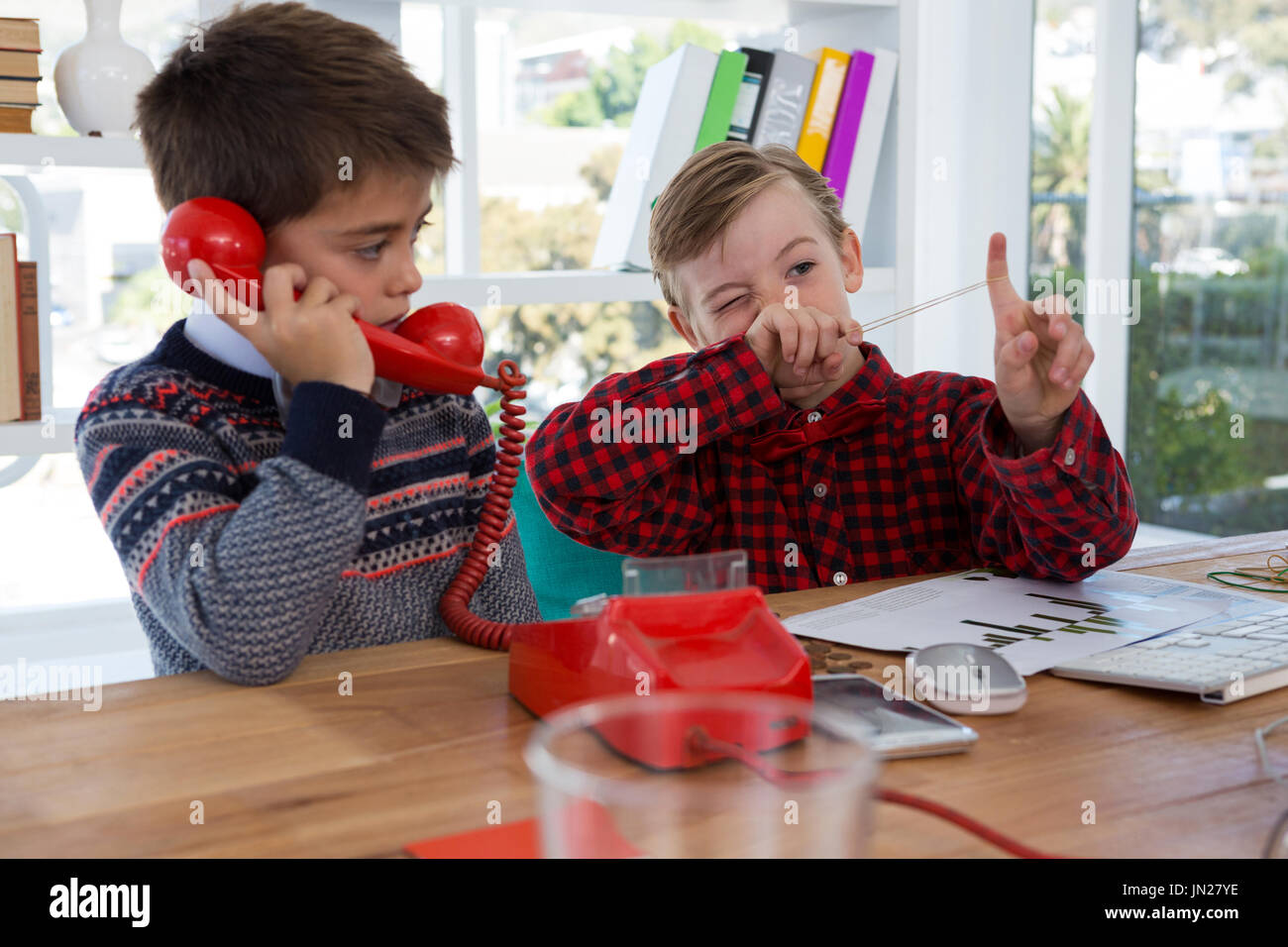 Kids as business executives working together in office Stock Photo - Alamy