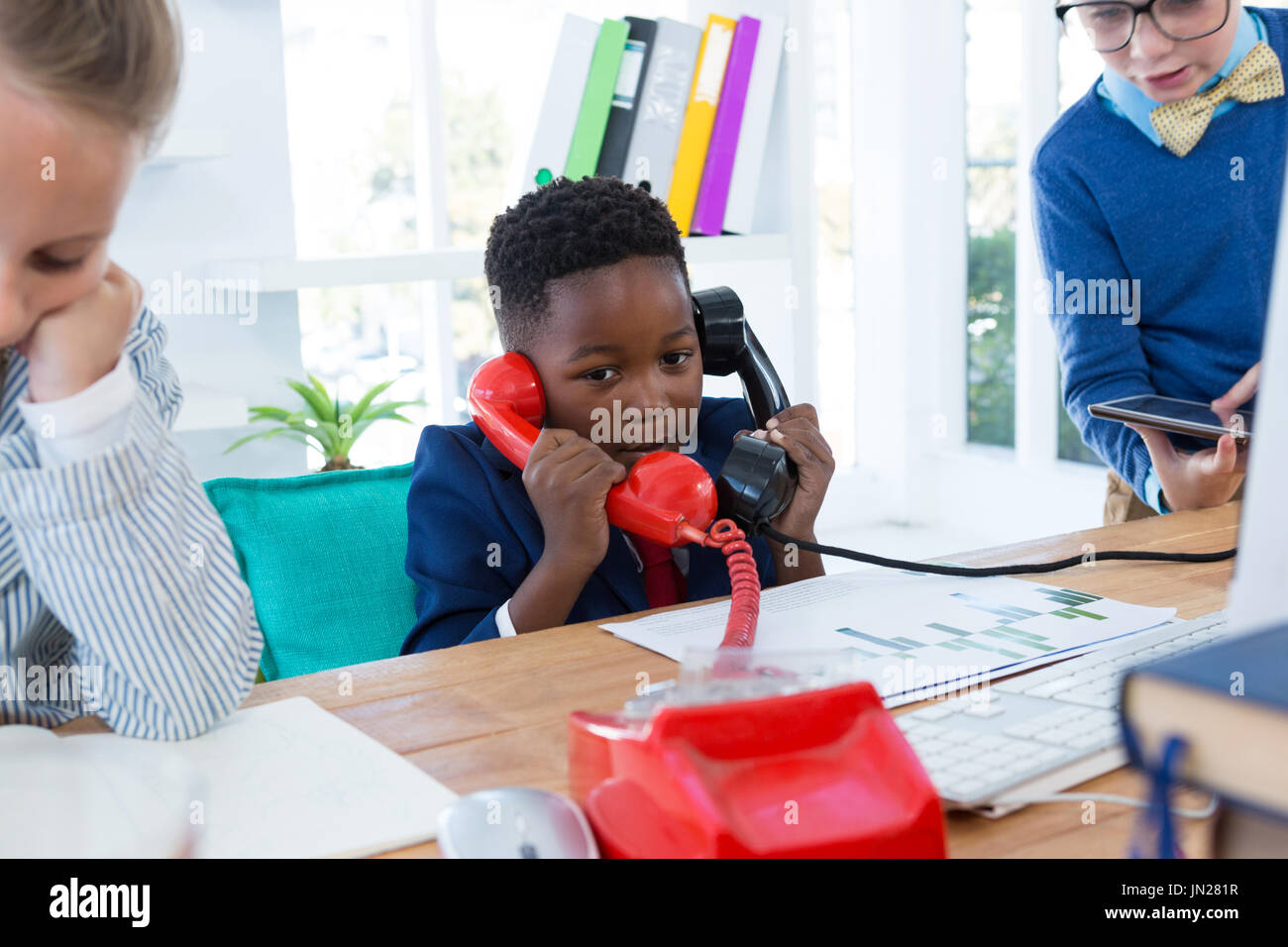 Boy girl office desk talking hi-res stock photography and images - Alamy