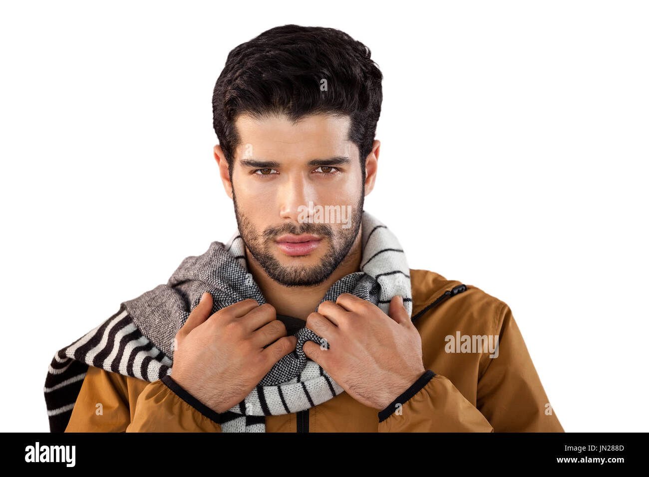 Portrait of man posing against white background Stock Photo - Alamy