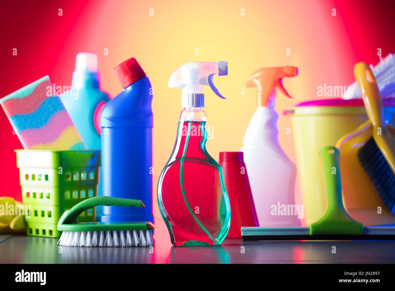 Variety of house cleaning products on a colorful background Stock Photo ...