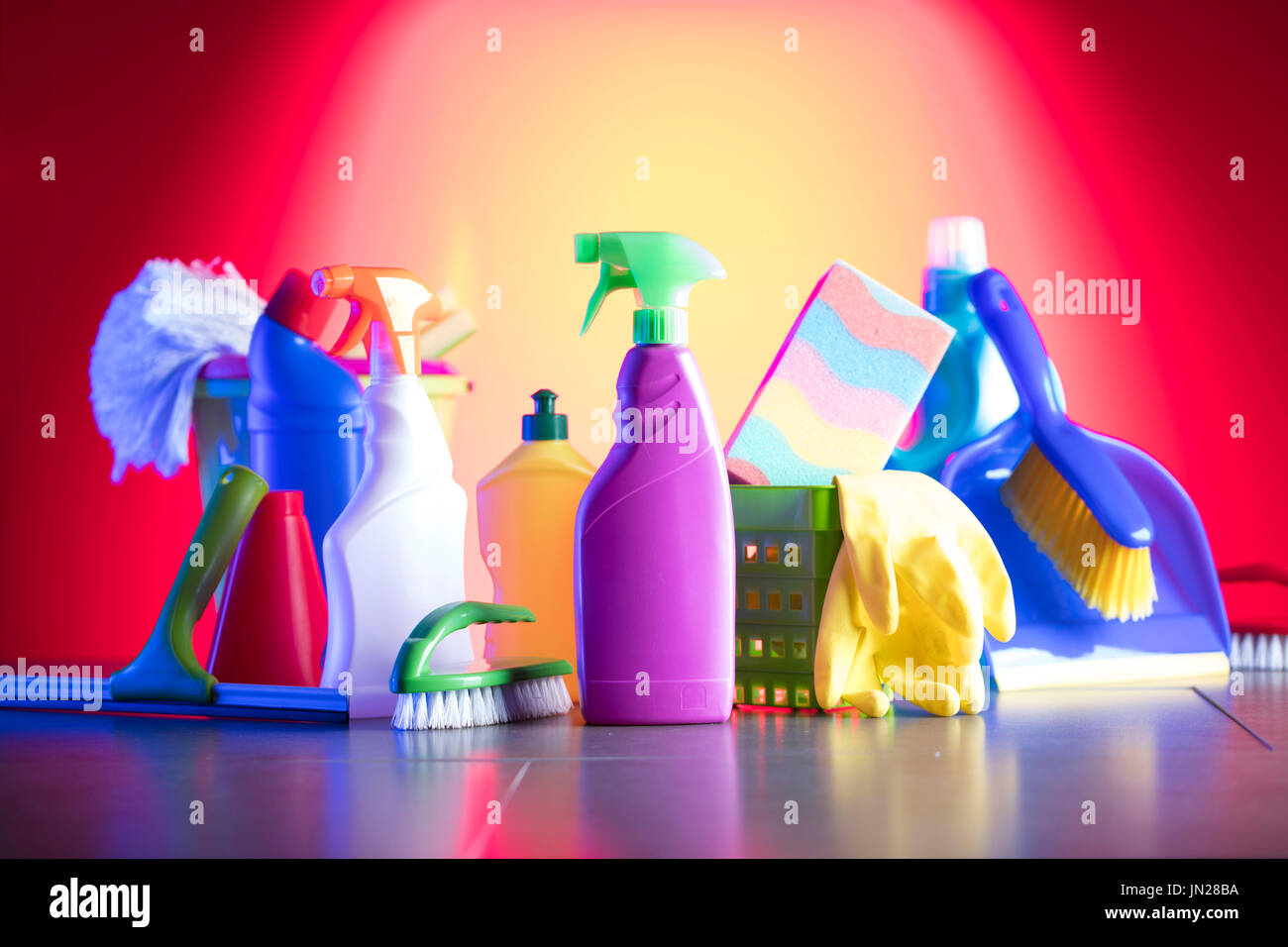 Variety of house cleaning products on a colorful background Stock Photo ...