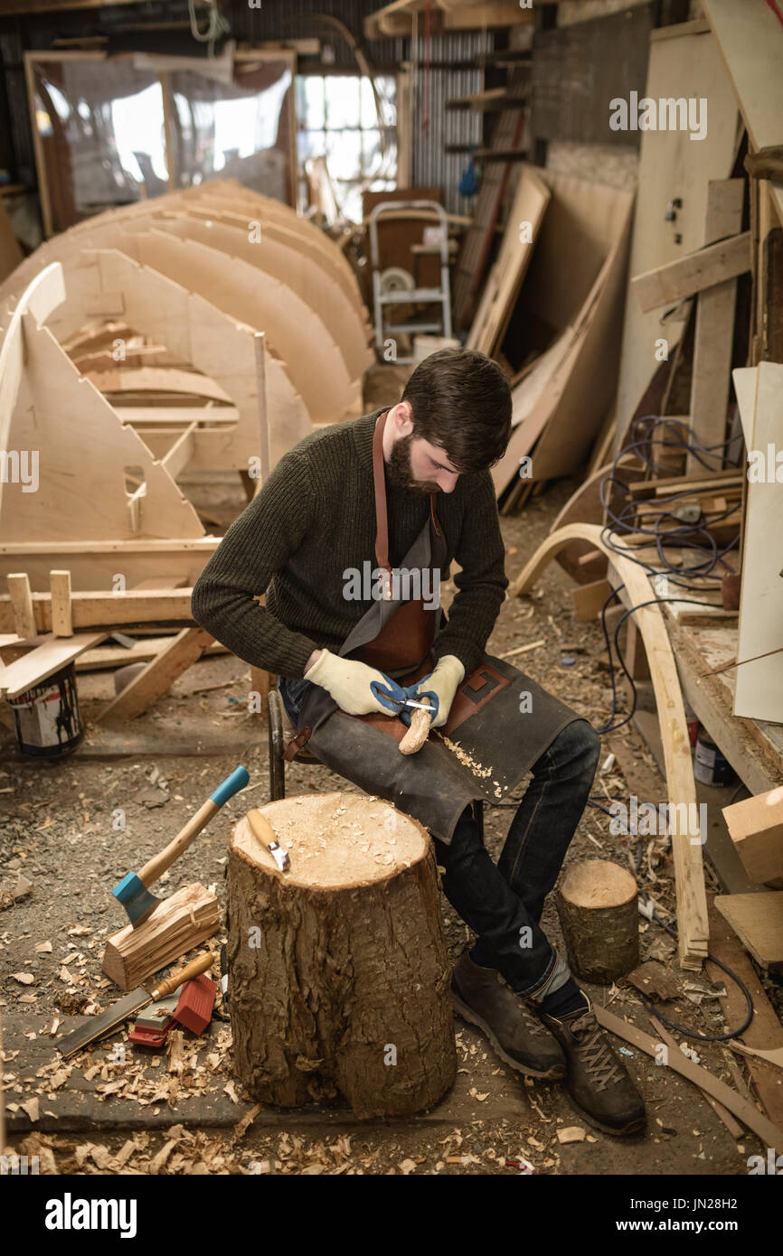 Carpenter making wooden spoon hi-res stock photography and images - Alamy