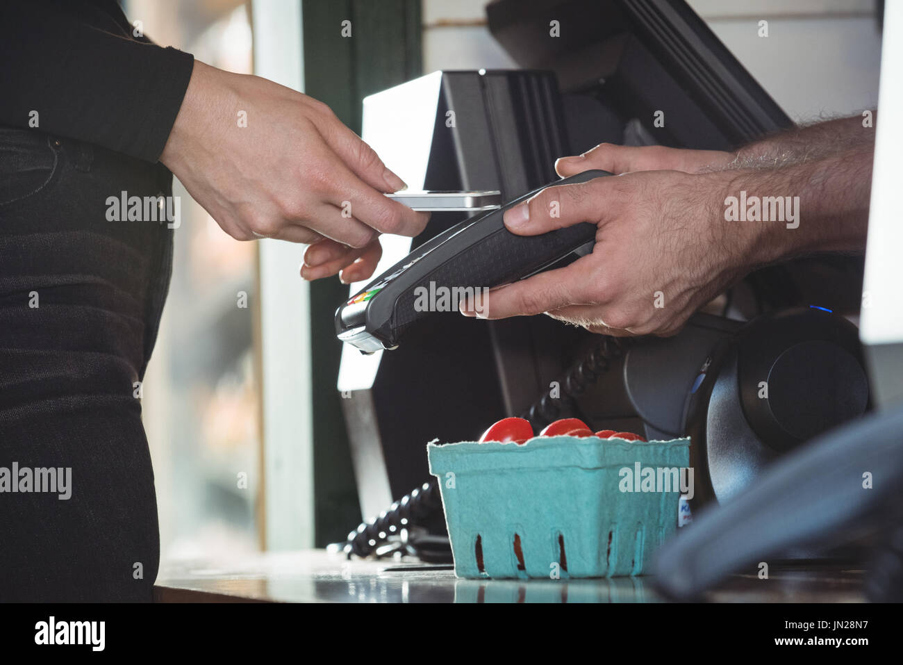 Woman smartphone using payment hi-res stock photography and images - Alamy