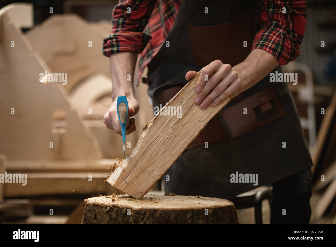 Focused carpenter shaping wood in hi-res stock photography and images ...