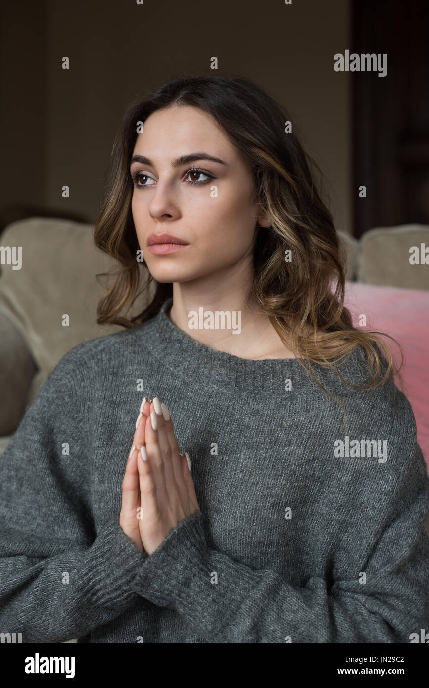Praying pose hi-res stock photography and images - Alamy