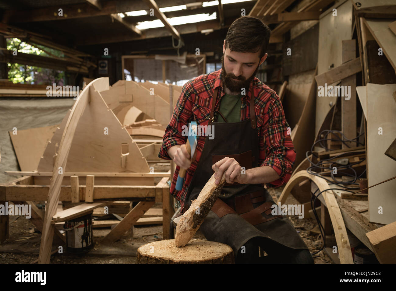 Focused carpenter shaping wood in hi-res stock photography and images ...