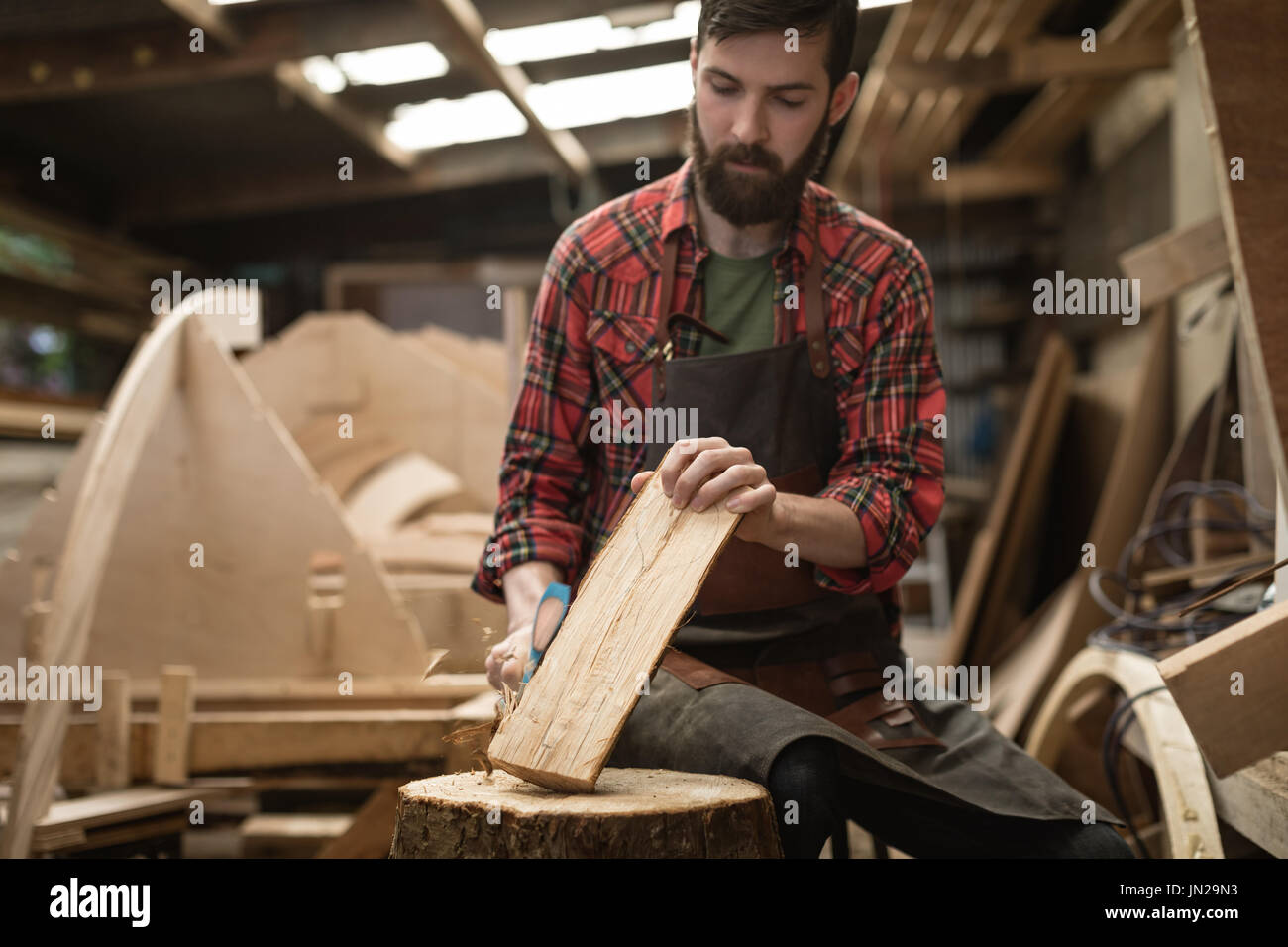 Focused carpenter shaping wood in hi-res stock photography and images ...