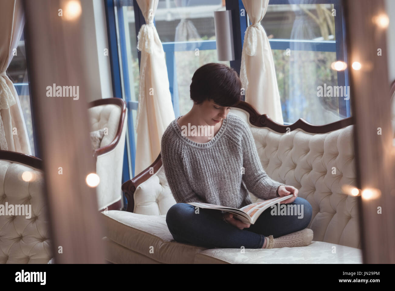 Woman reading home modern hi-res stock photography and images - Alamy