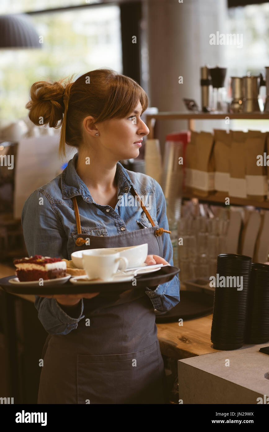 Cafe cake waitress hi-res stock photography and images - Alamy