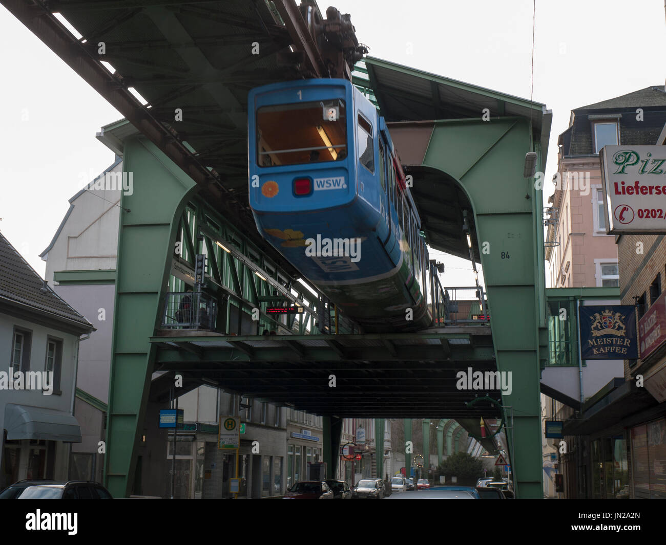 Monorail "Die Schwebebahn" pulling into a station in Wuppertal, Germany ...
