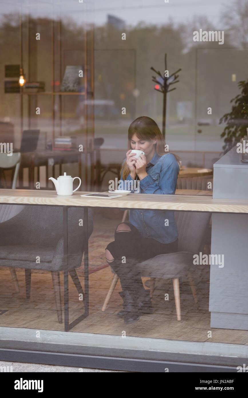 Beautiful woman in cafe hi-res stock photography and images - Alamy
