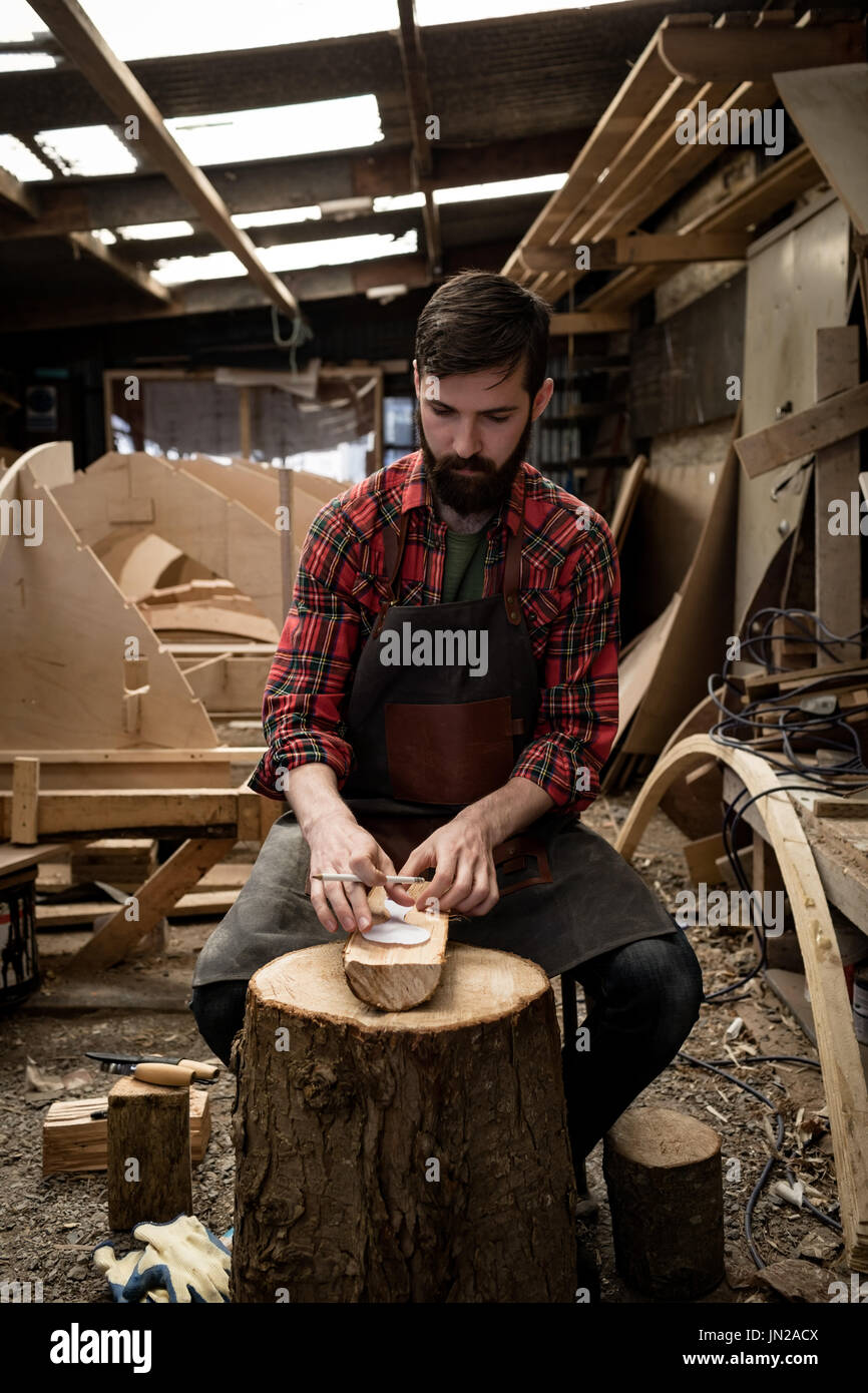 Focused carpenter shaping wood in hi-res stock photography and images ...