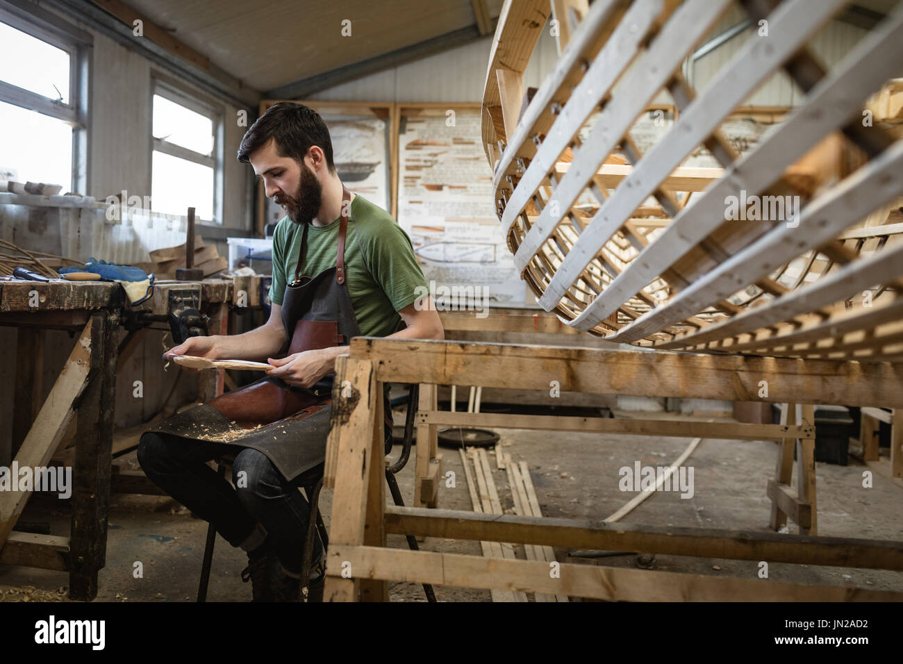 Carpenter making wooden spoon hi-res stock photography and images - Alamy