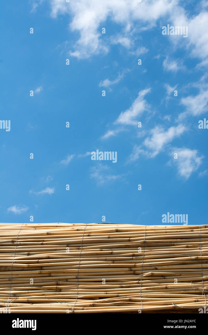 Mat made of straw used as a wall outdoors Stock Photo - Alamy