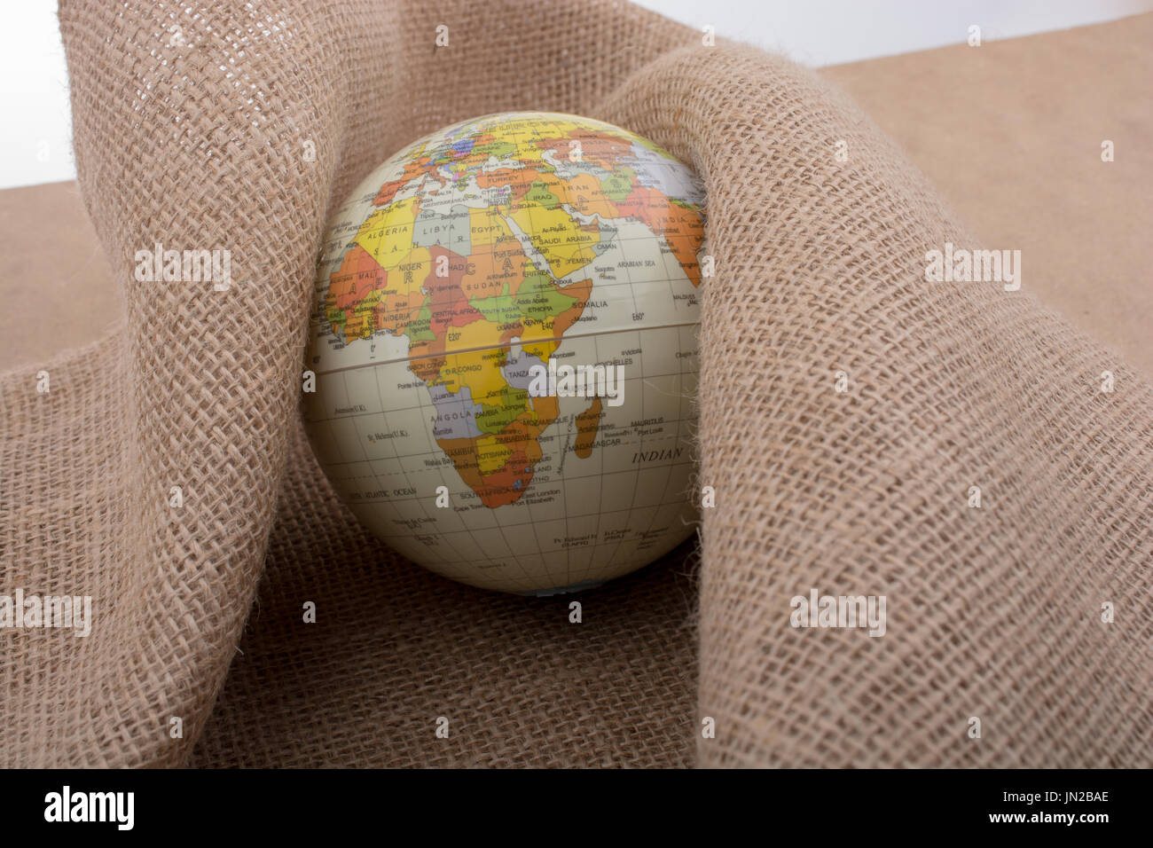 Globe is placed on canvas background Stock Photo - Alamy