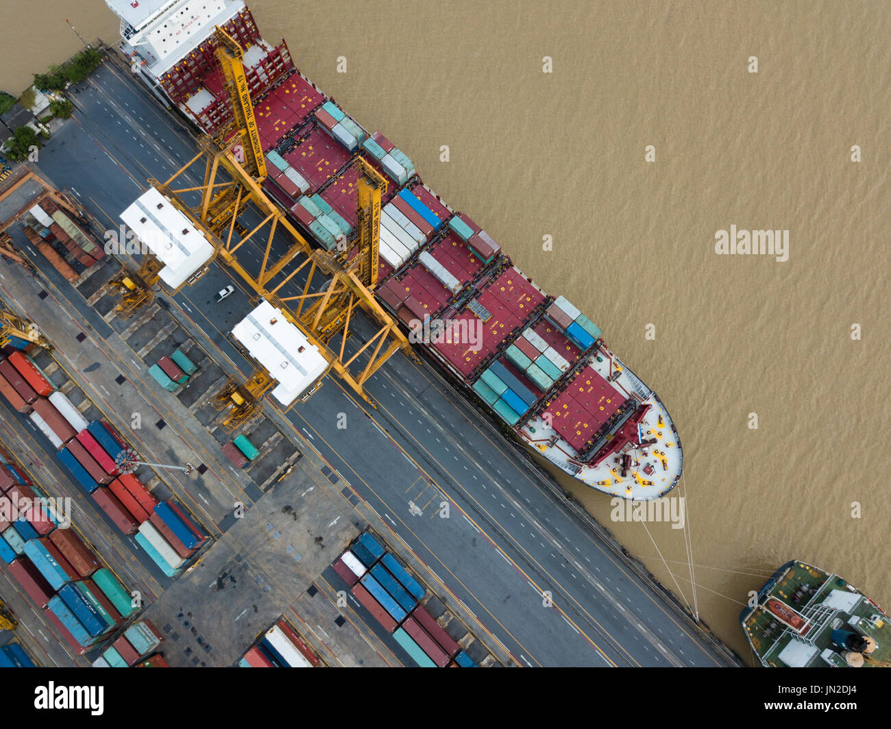 Aerial view of cargo ship port Stock Photo - Alamy