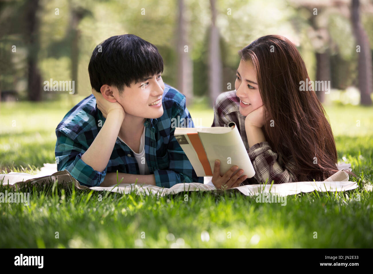 Young indian couple reading books hi-res stock photography and images ...