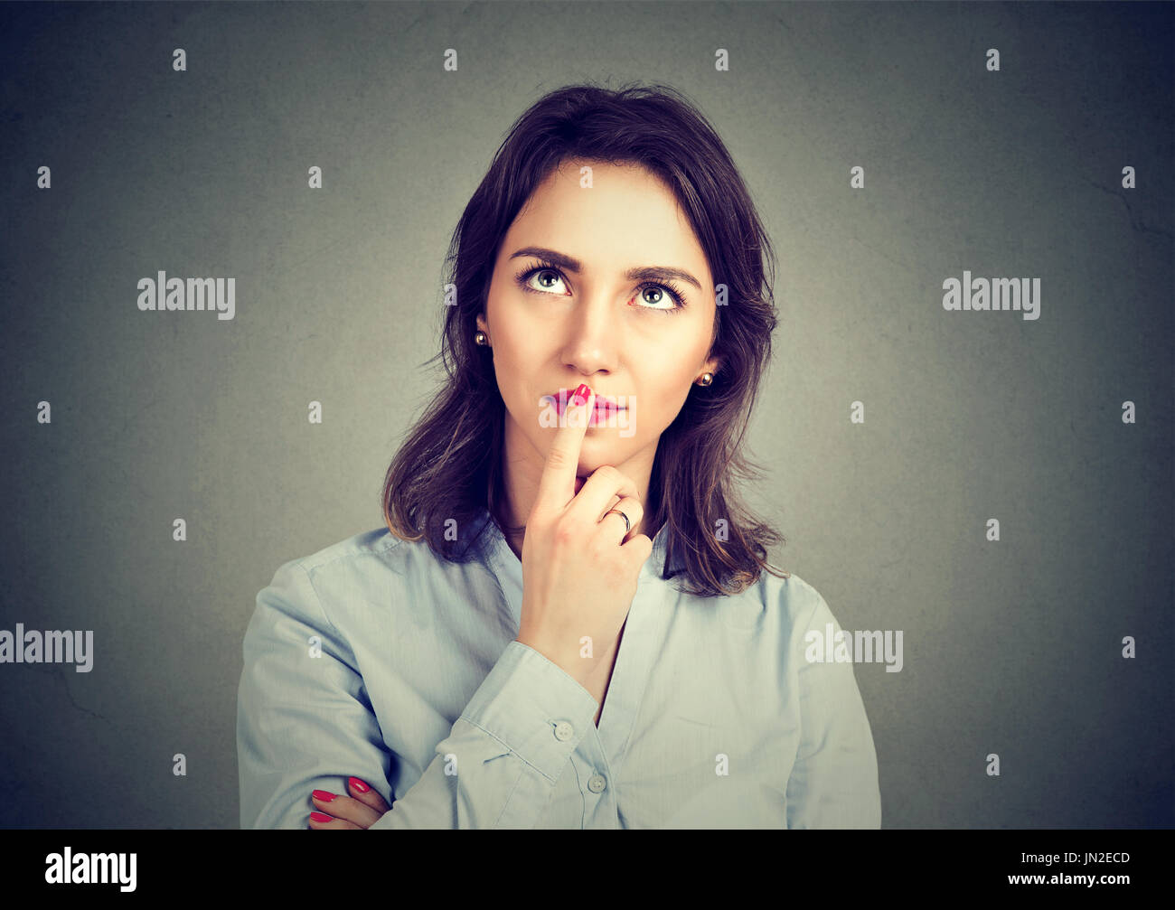 Doubtful woman hi-res stock photography and images - Alamy