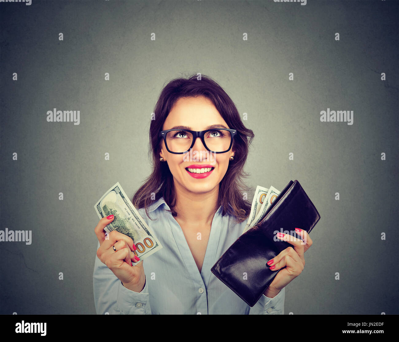 Money out of wallet hi-res stock photography and images - Alamy