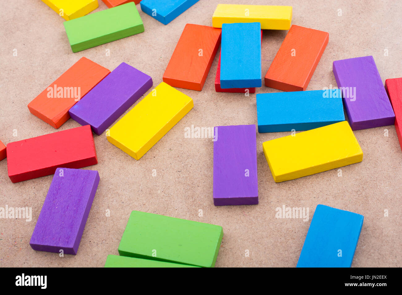 Wooden blocks of various color randomly scattered Stock Photo - Alamy