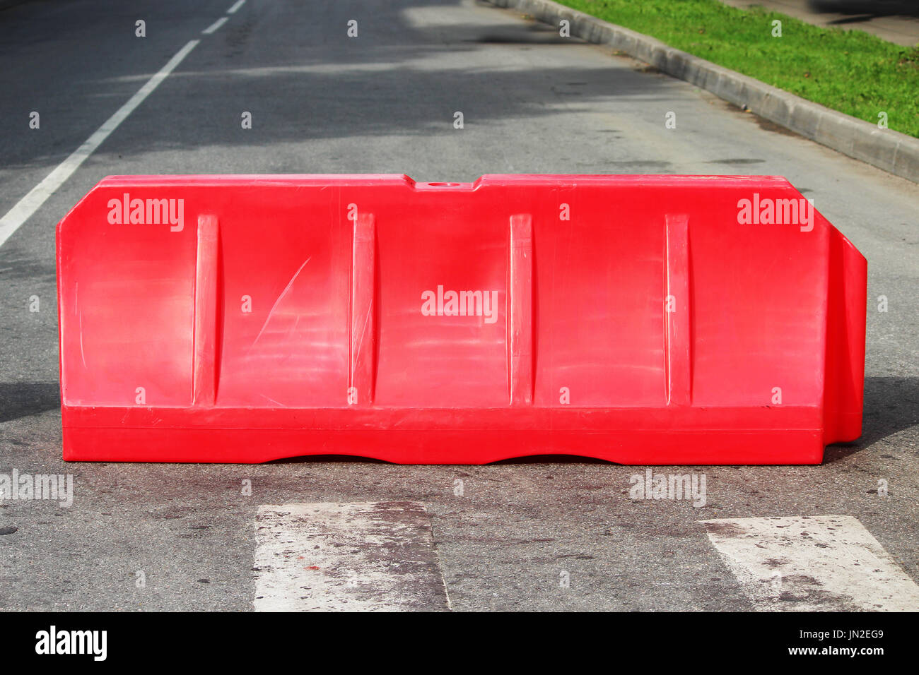 Red plastic barrier are blocking the road Stock Photo - Alamy