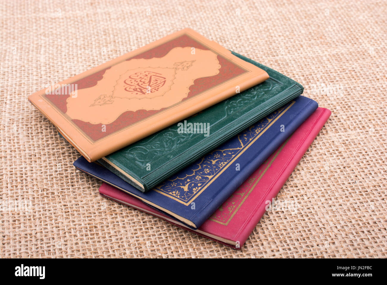 Little books are placed on canvas background Stock Photo - Alamy