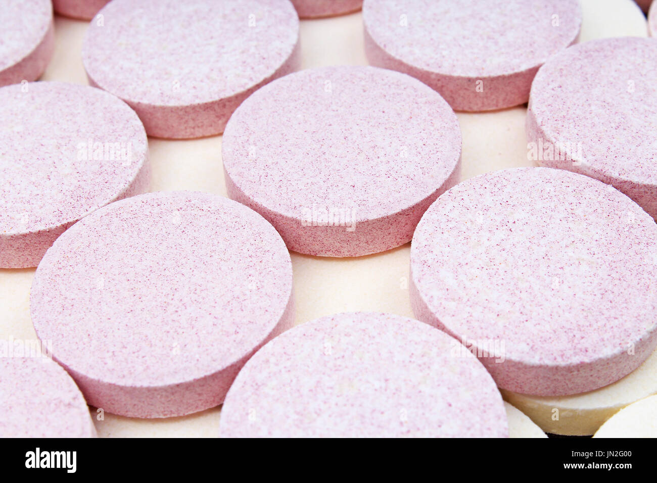 Stack of vitamin mineral supplement effervescent tablets pattern ...