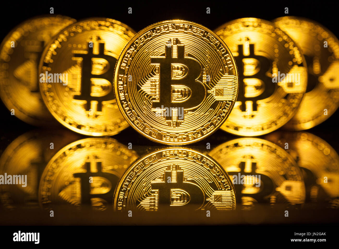 Five Virtual Coins Bitcoins Stock Photo - Alamy