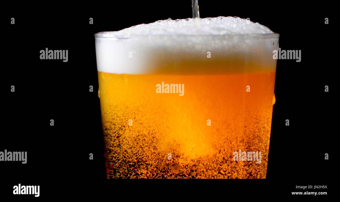 Pouring pint of lager hi-res stock photography and images - Alamy