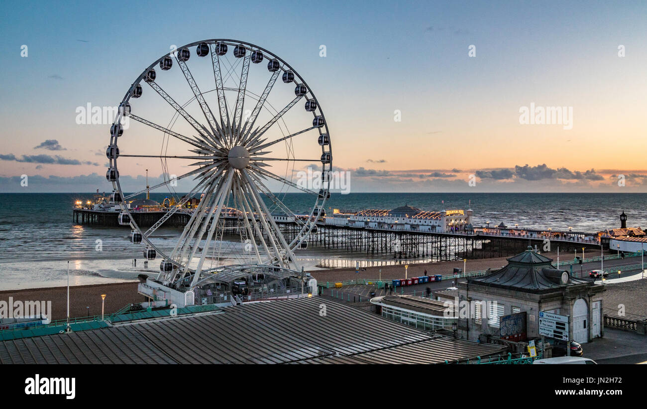 The Victorian Brighton Pier and the Brighton wheel at sunset Stock ...