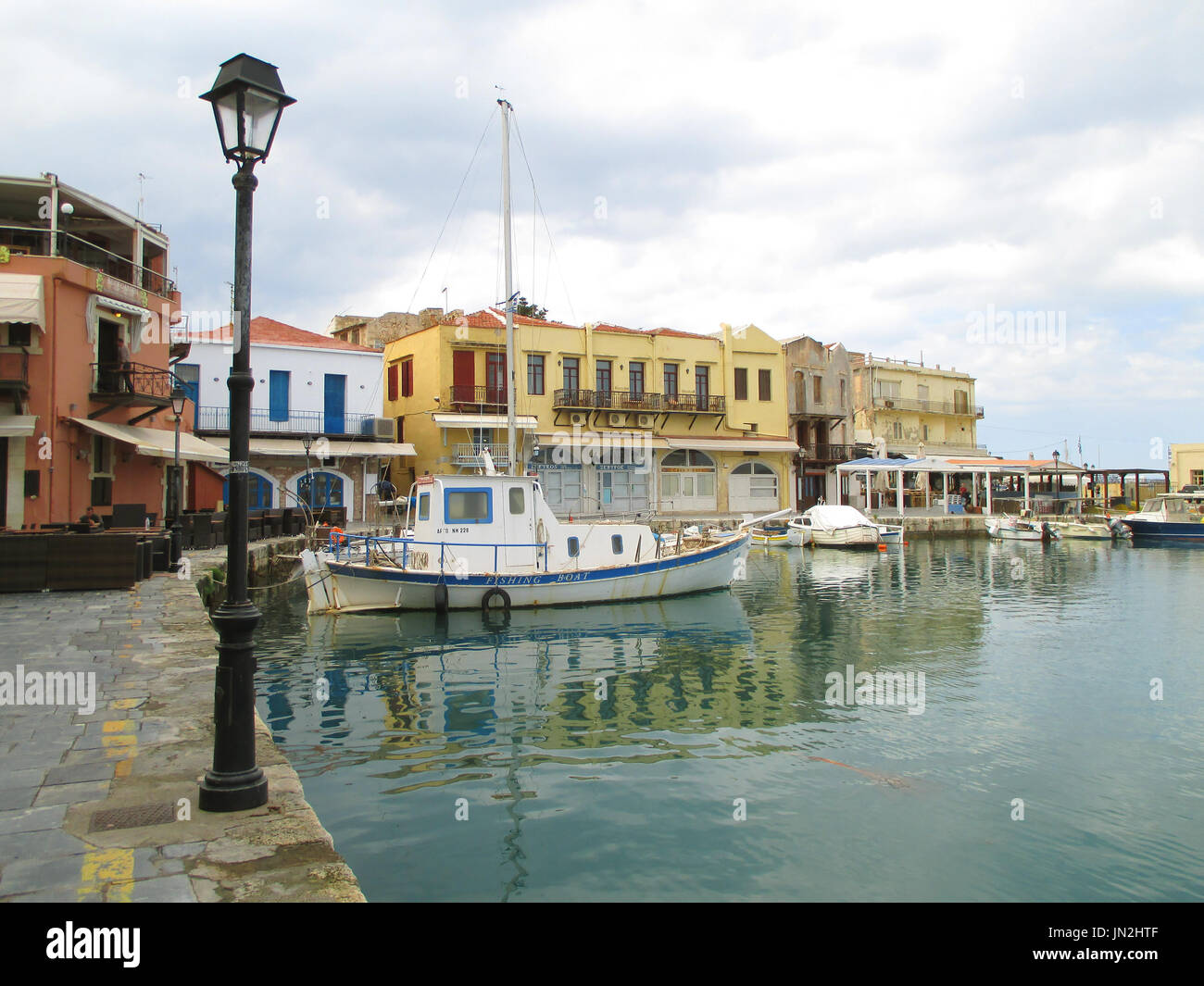 Promenade along the Old Venetian Harbor of Rethymno on Crete Island of ...