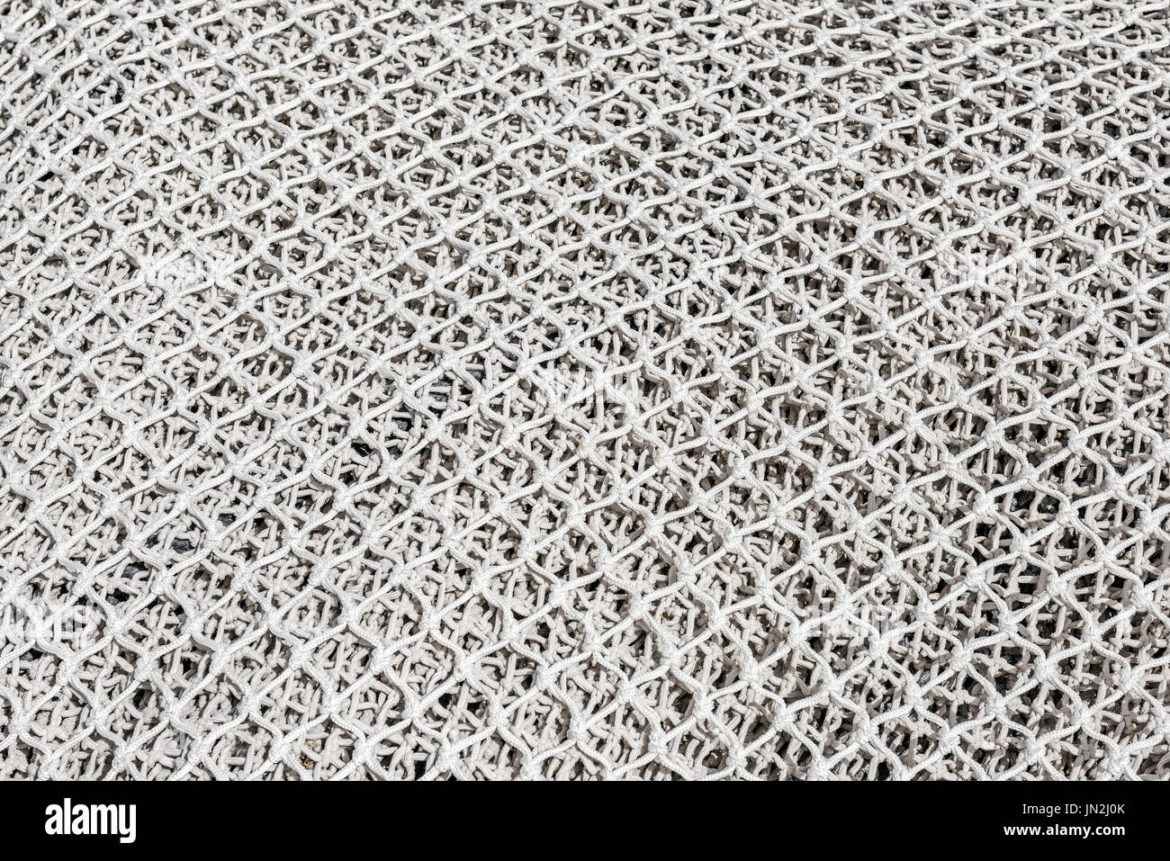 Fishing net background Stock Photo - Alamy