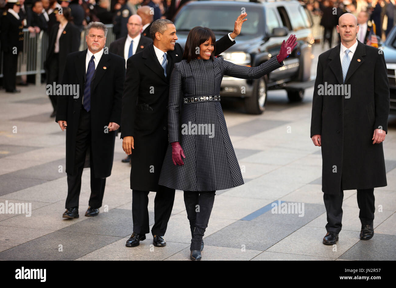 United States President Barack Obama and First lady Michelle Obama walk ...