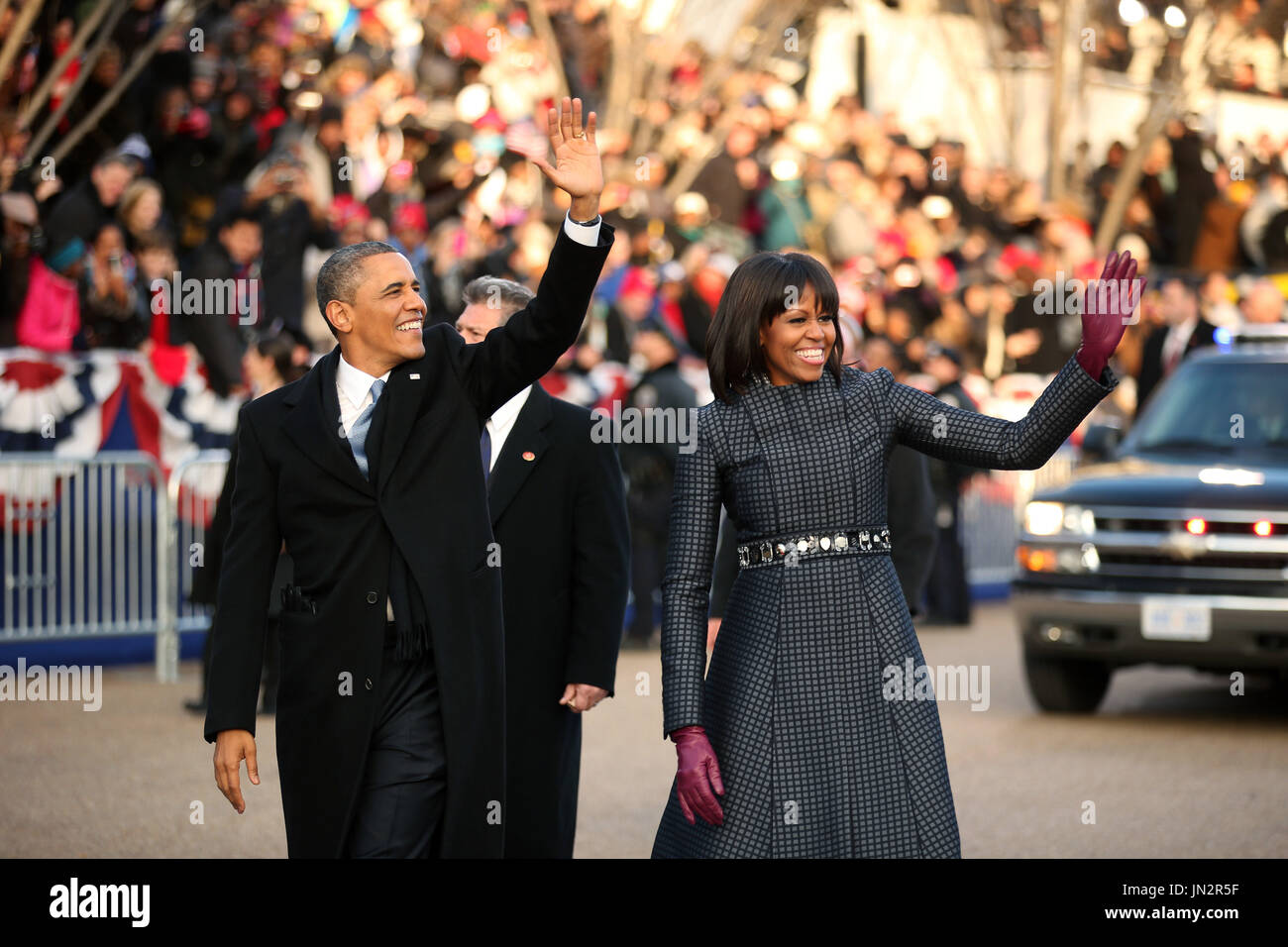 United States President Barack Obama and First lady Michelle Obama walk ...
