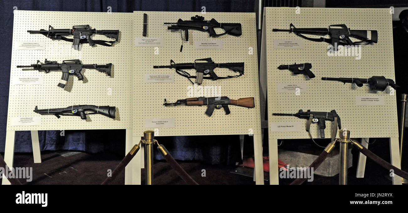 A display of various types of assault weapons is shown at the press ...