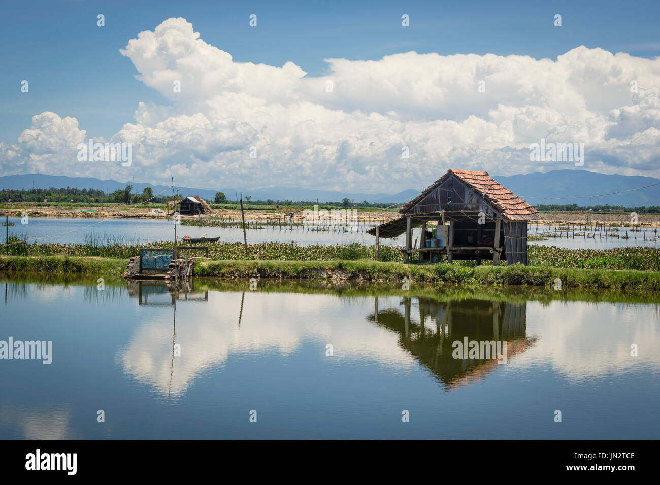 Rustic huts in fishing area along Thu Bon River in Vietnamese ...